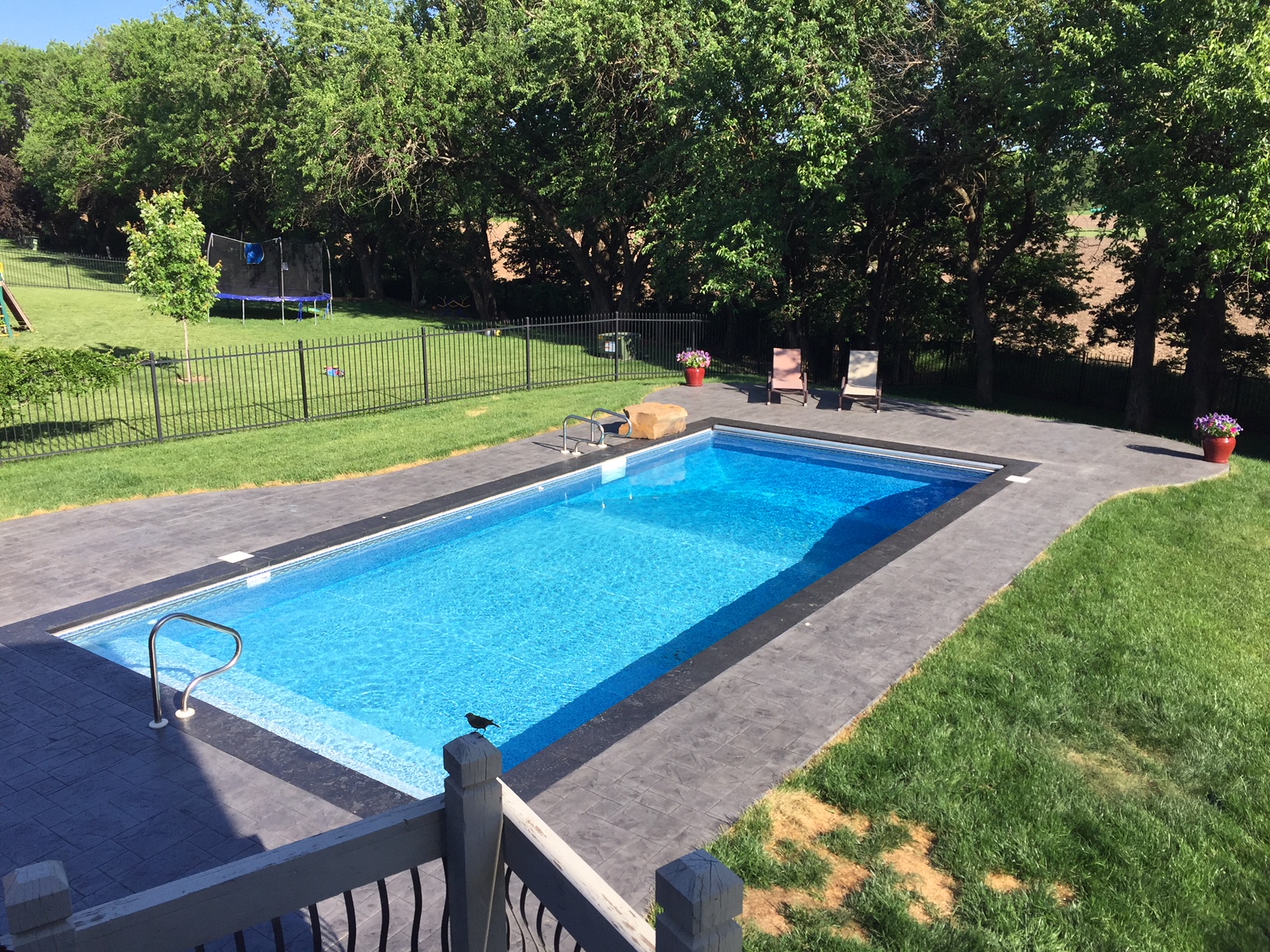 Concrete Swimming Pool Decks | E & J Concrete and Dirt Work