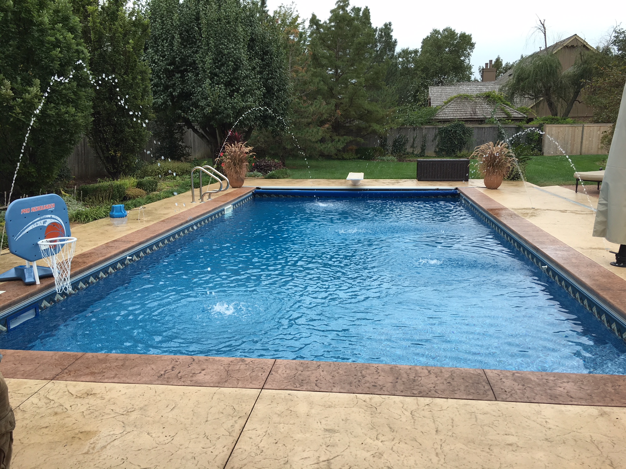 Concrete Swimming Pool Decks | E & J Concrete and Dirt Work